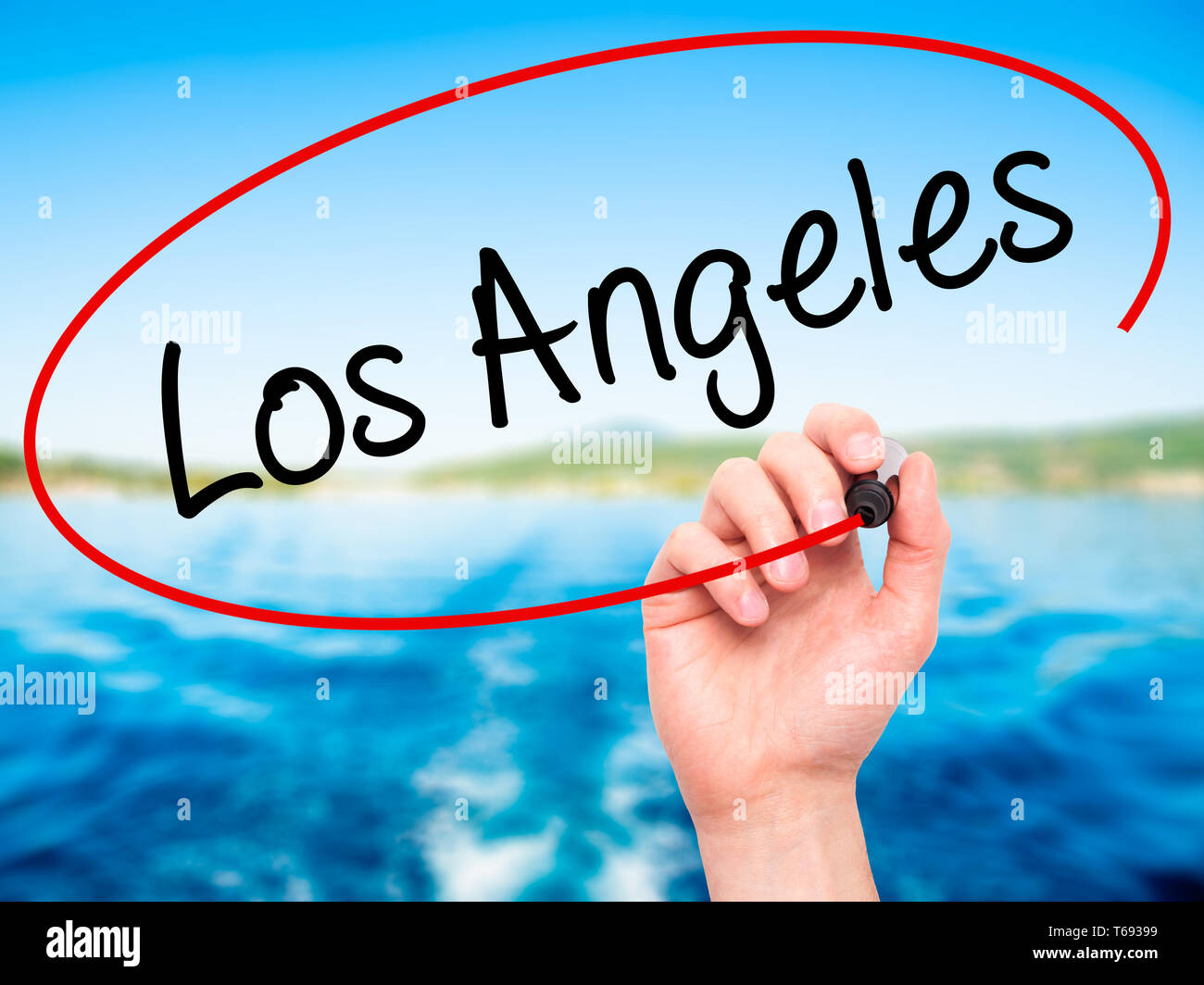 Man Hand writing Los Angeles with black marker on visual screen Stock ...