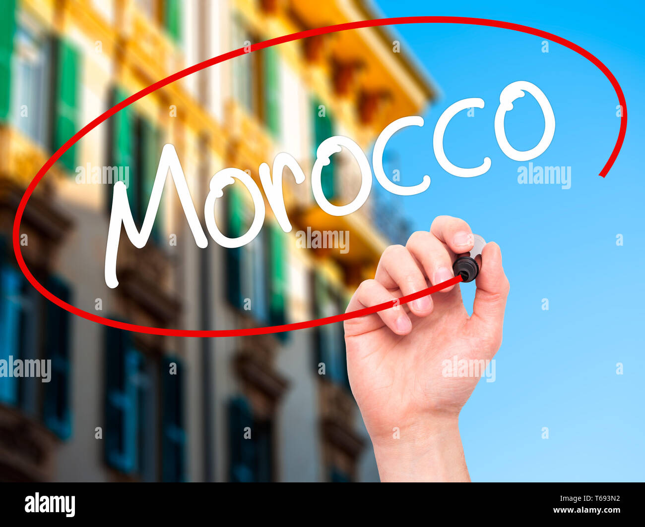 Man Hand writing Morocco with black marker on visual screen Stock Photo ...
