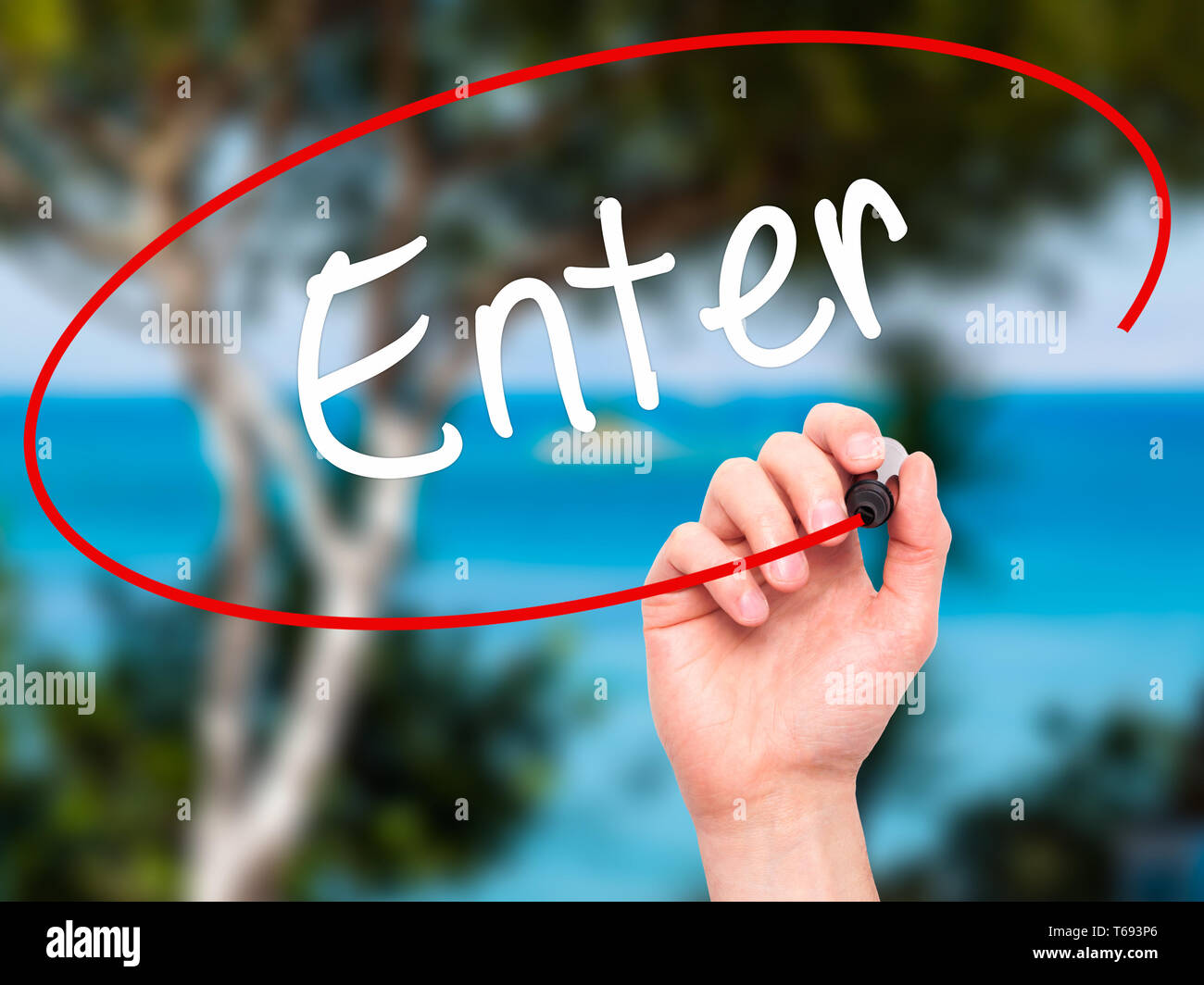 Man Hand writing Enter with black marker on visual screen Stock Photo ...