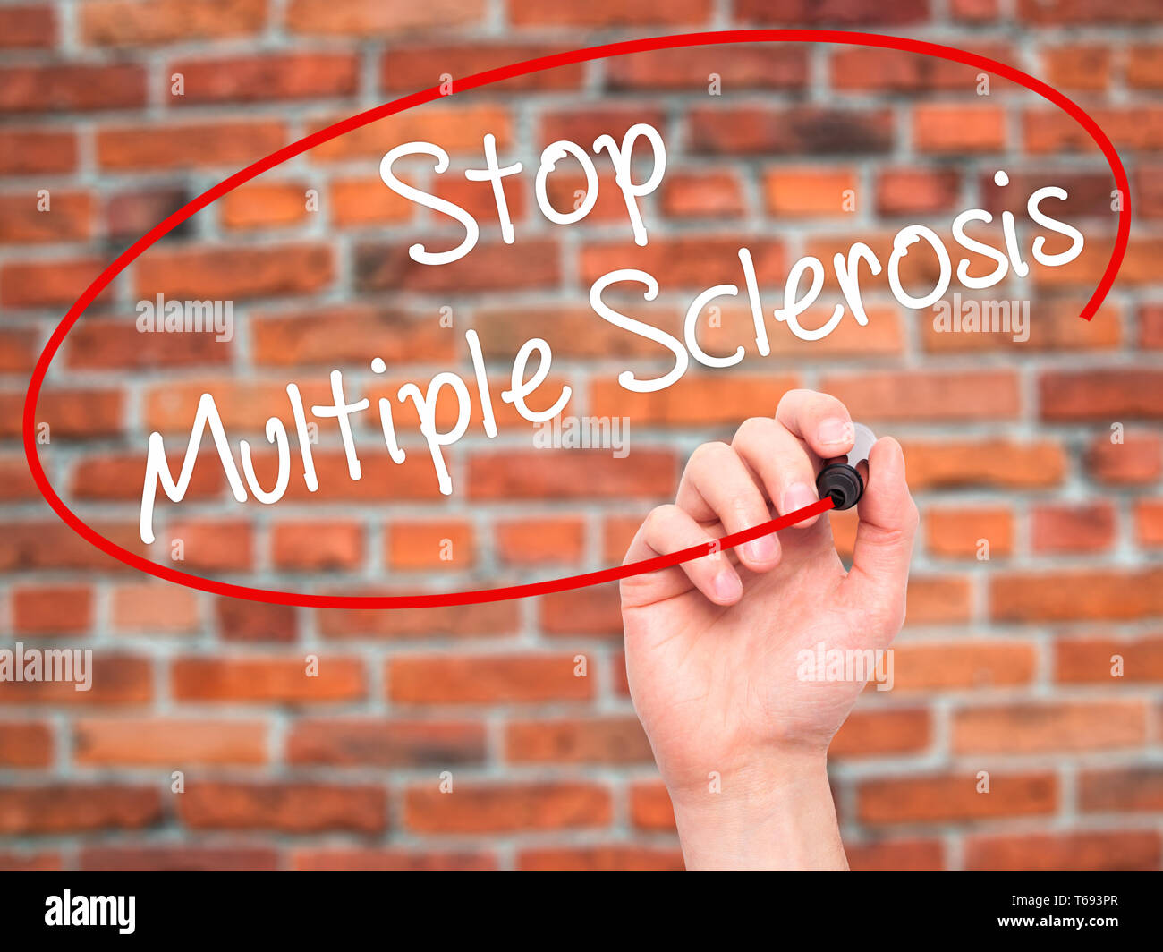 Man Hand writing Stop Multiple Sclerosis with black marker on visual ...