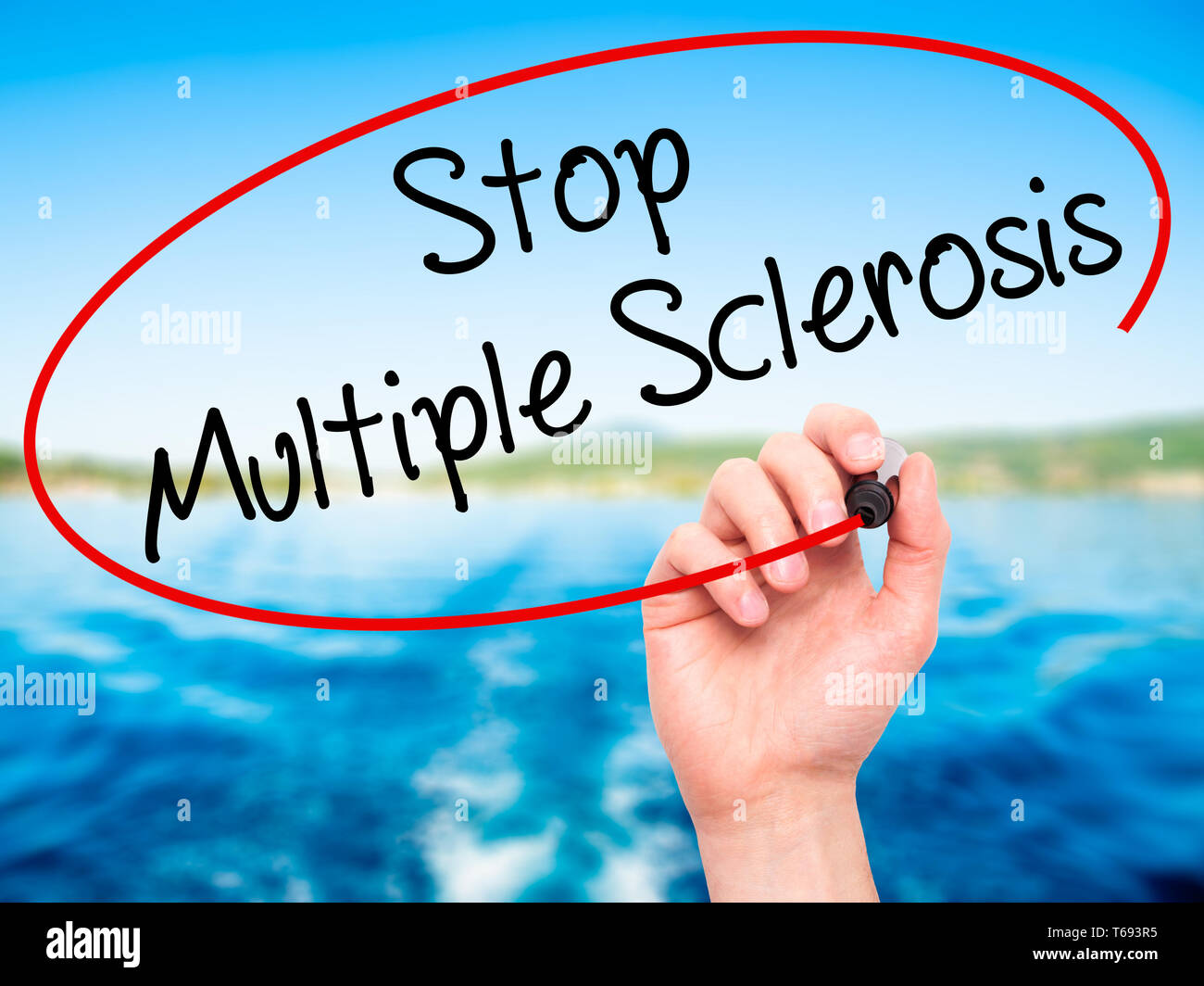 Man Hand writing Stop Multiple Sclerosis with black marker on visual ...