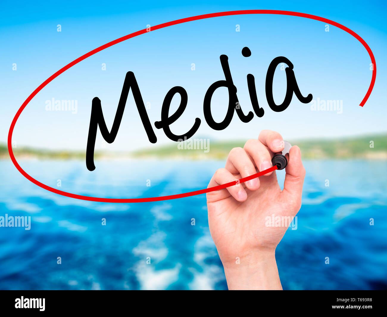 Man Hand writing Media with black marker on visual screen Stock Photo ...