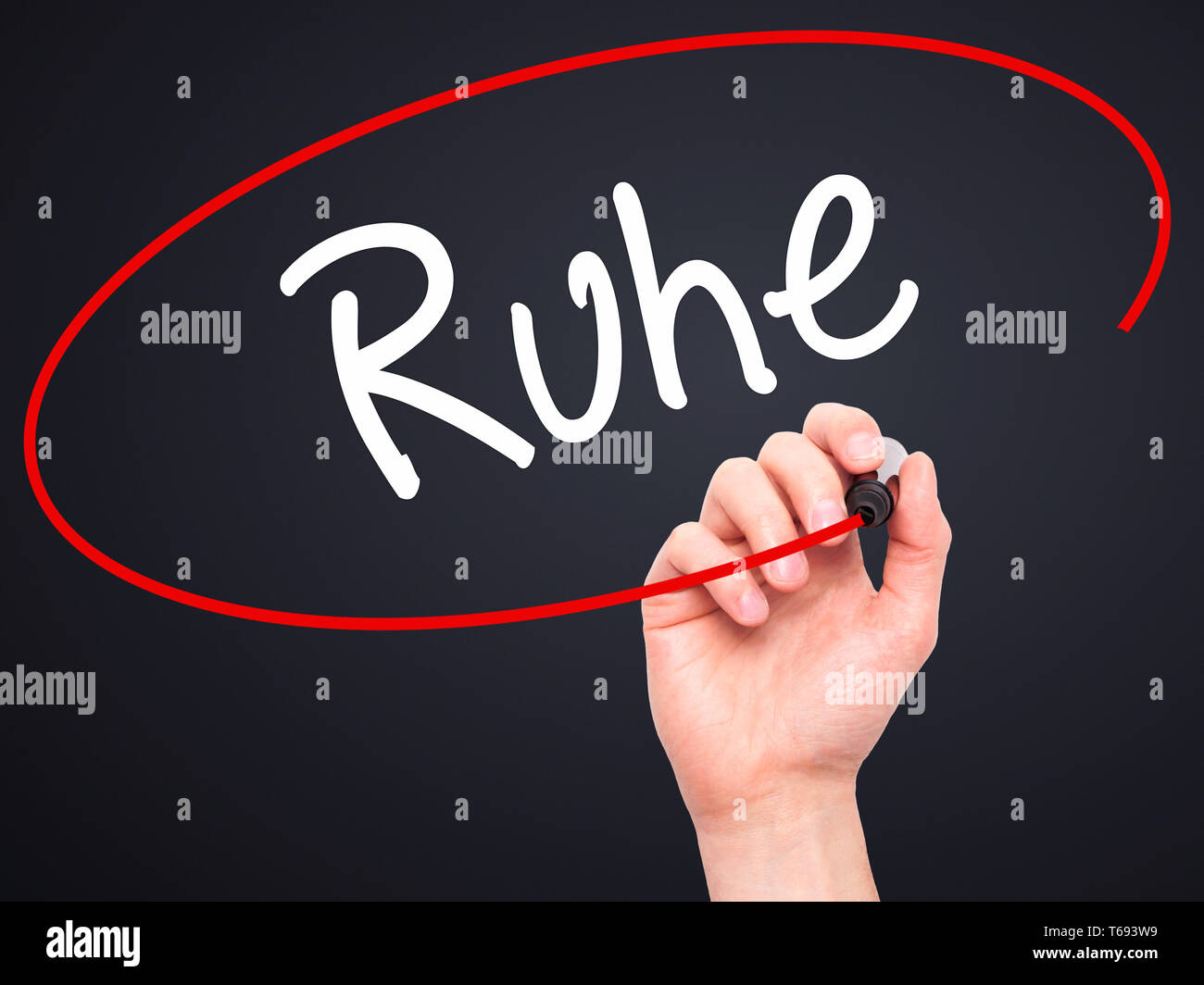 Man Hand writing Ruhe (Quiet in German) with black marker on visual ...