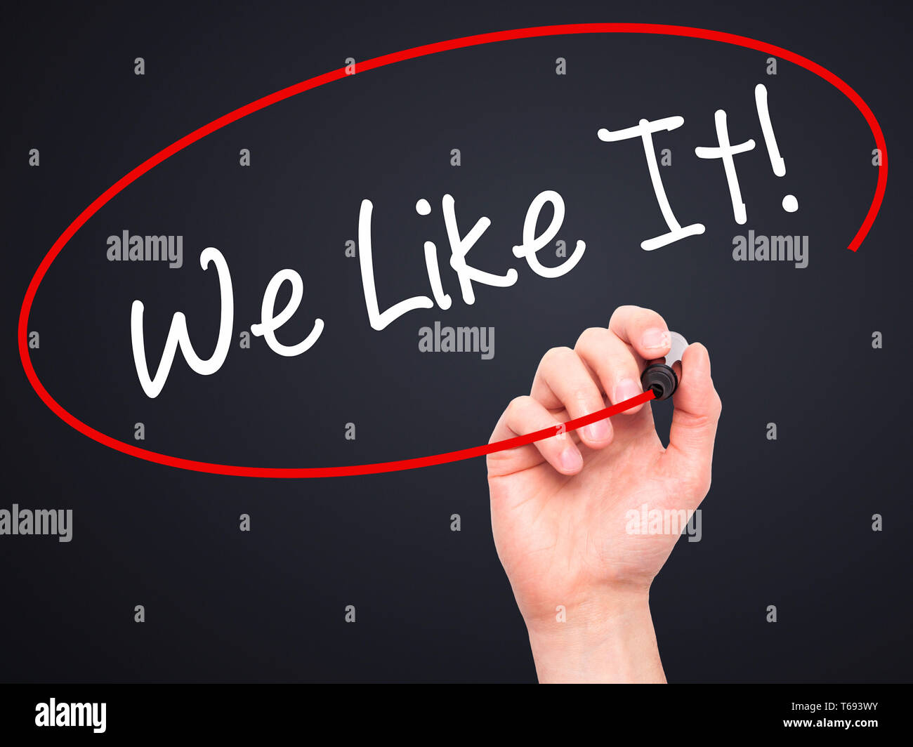 Man Hand writing We Like It! with black marker on visual screen Stock ...