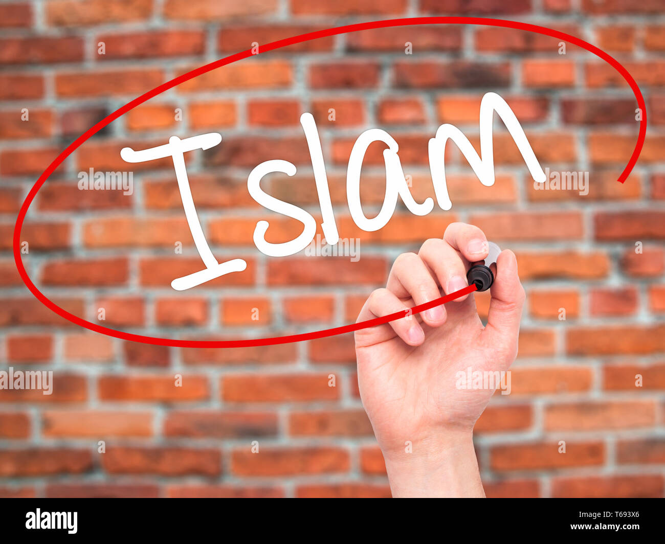 Man Hand writing Islam with black marker on visual screen Stock Photo ...