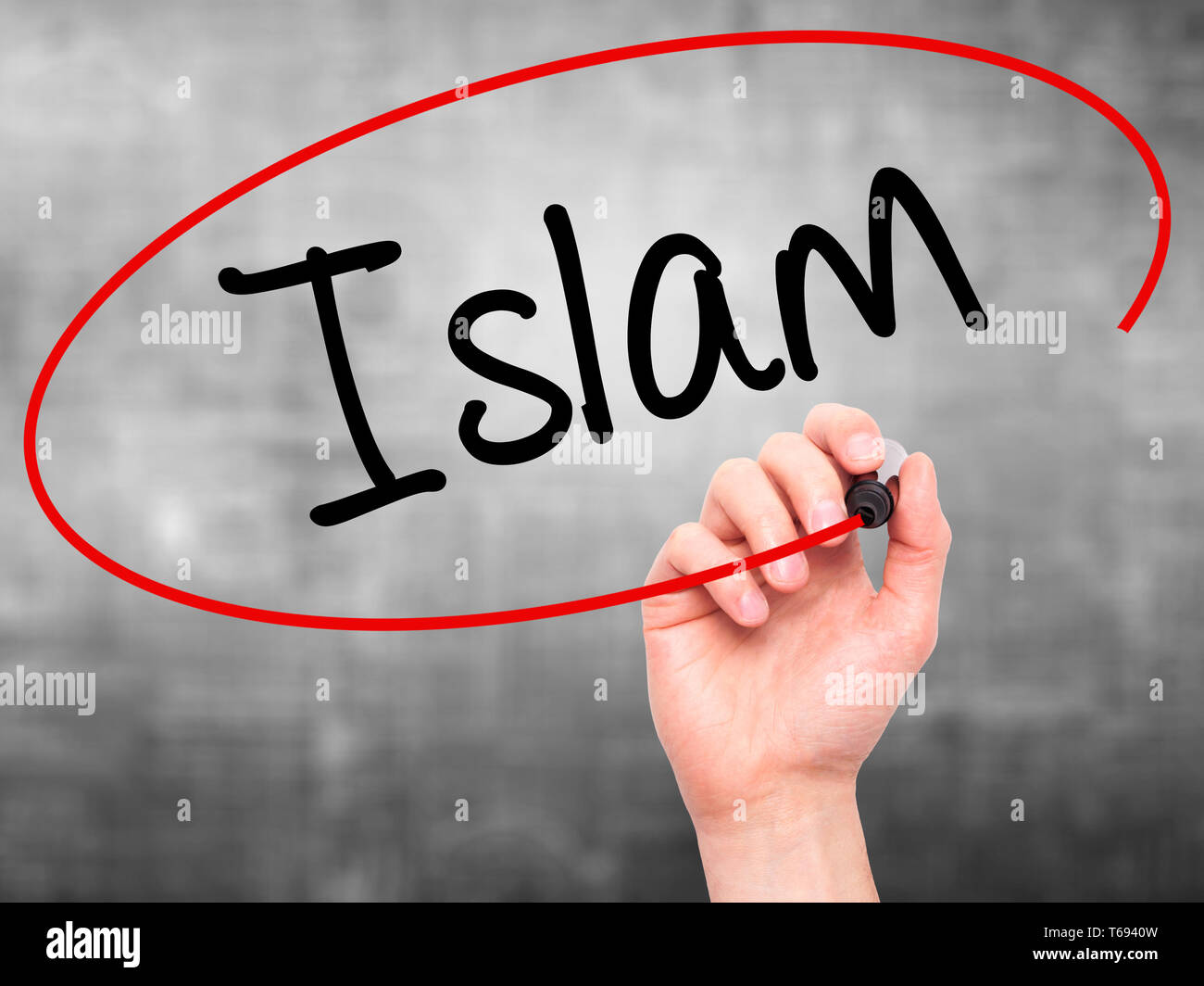 Man Hand writing Islam with black marker on visual screen Stock Photo ...