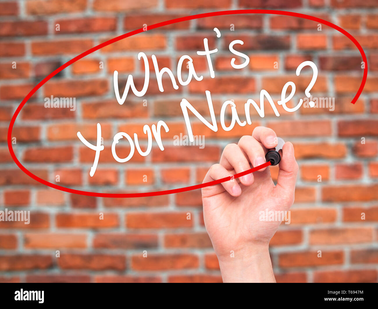 Man Hand writing What's your Name? with black marker on visual screen ...