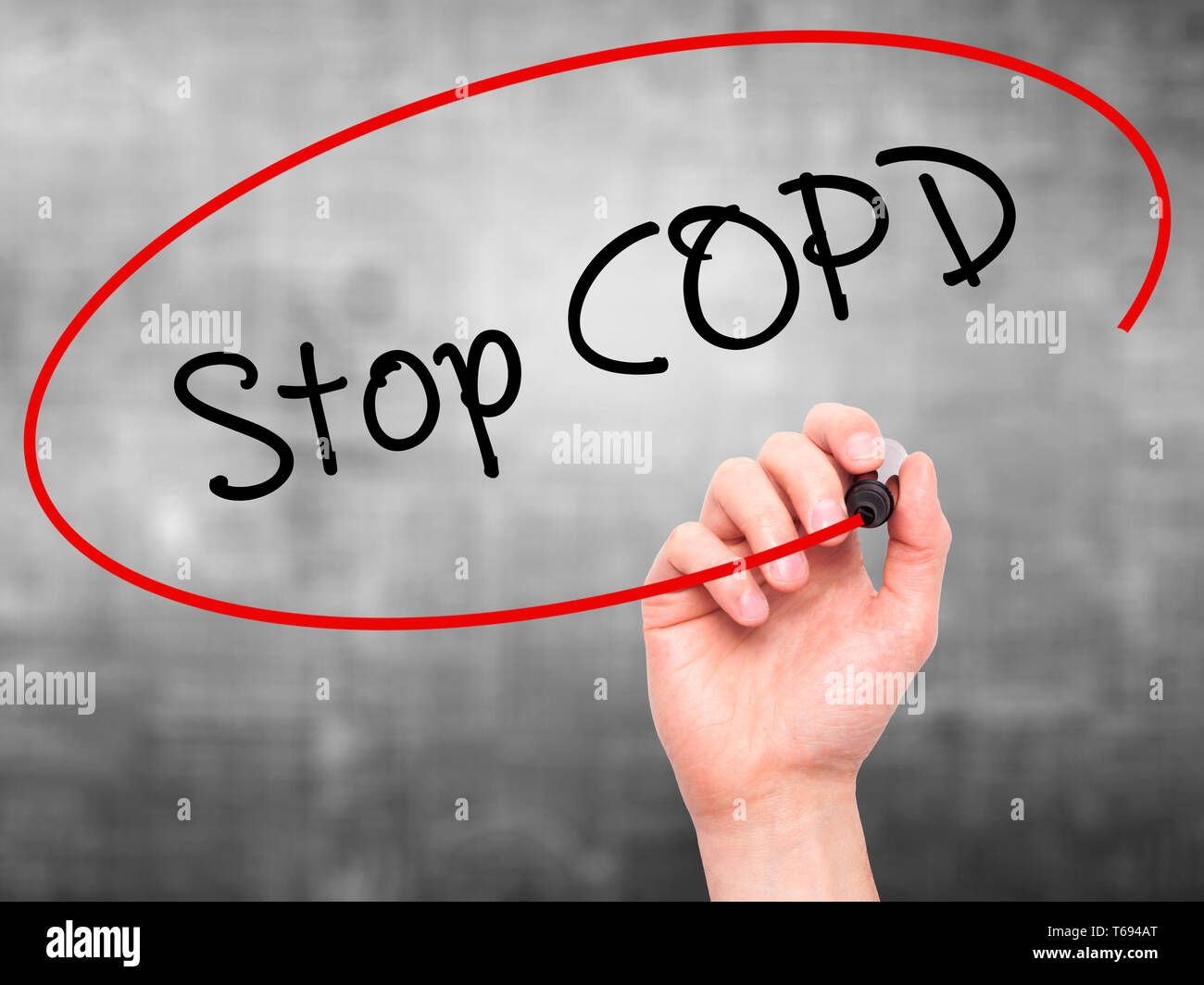 Man Hand writing Stop COPD with black marker on visual screen Stock ...