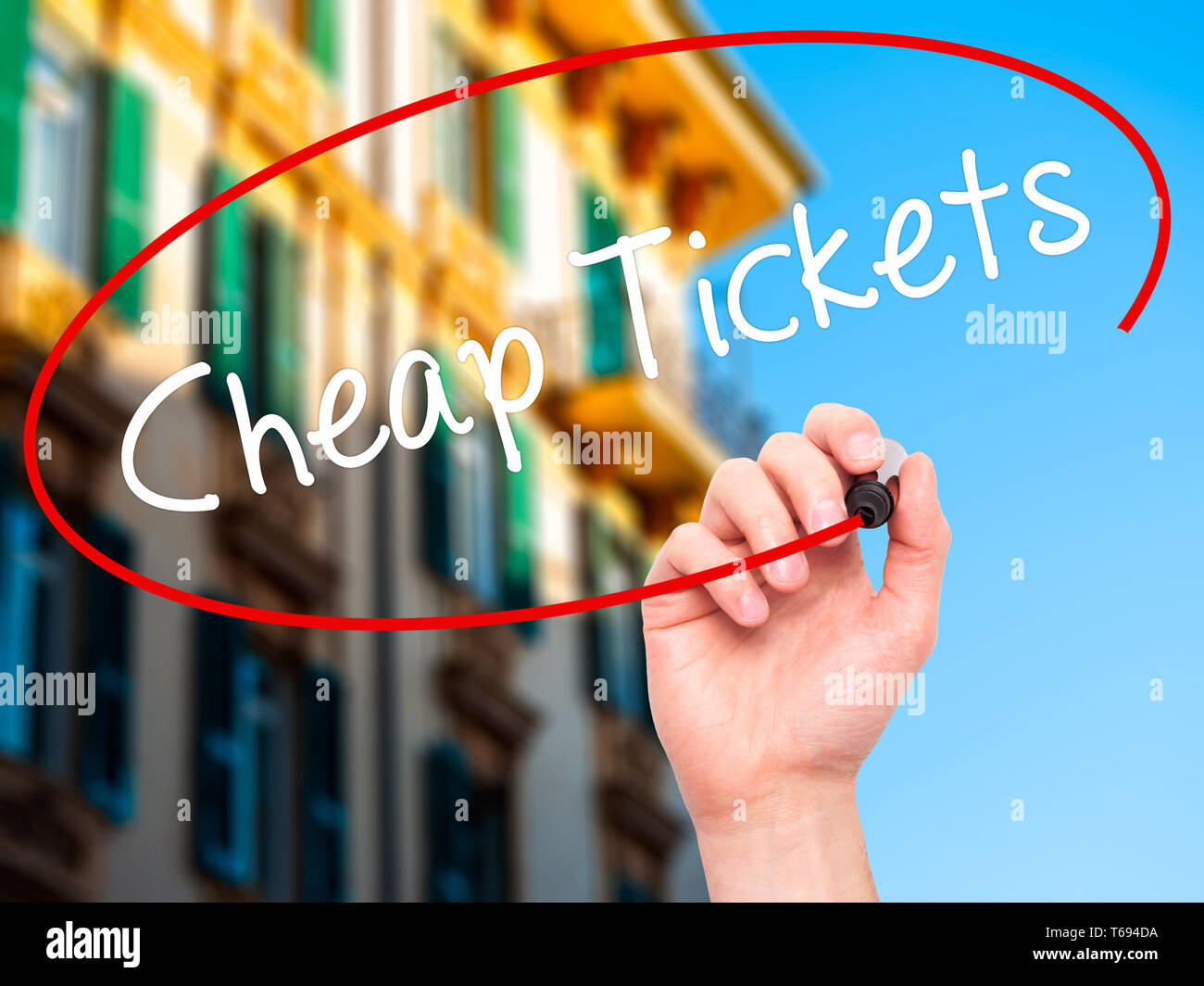 Man Hand writing Cheap Tickets with black marker on visual screen Stock ...