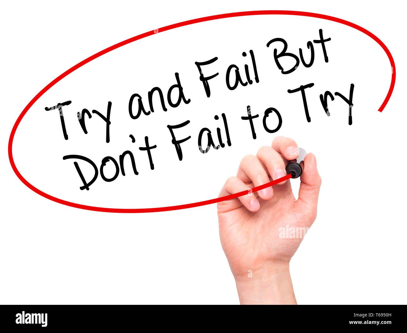 Man Hand writing Try and Fail But Don't Fail to Try with black marker ...