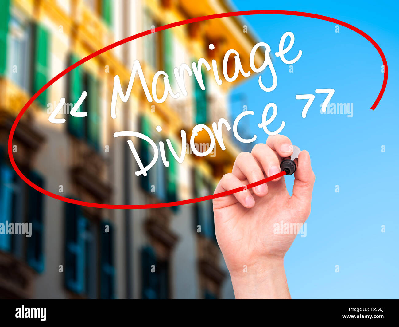 Man Hand writing Marriage - Divorce with black marker on visual screen ...