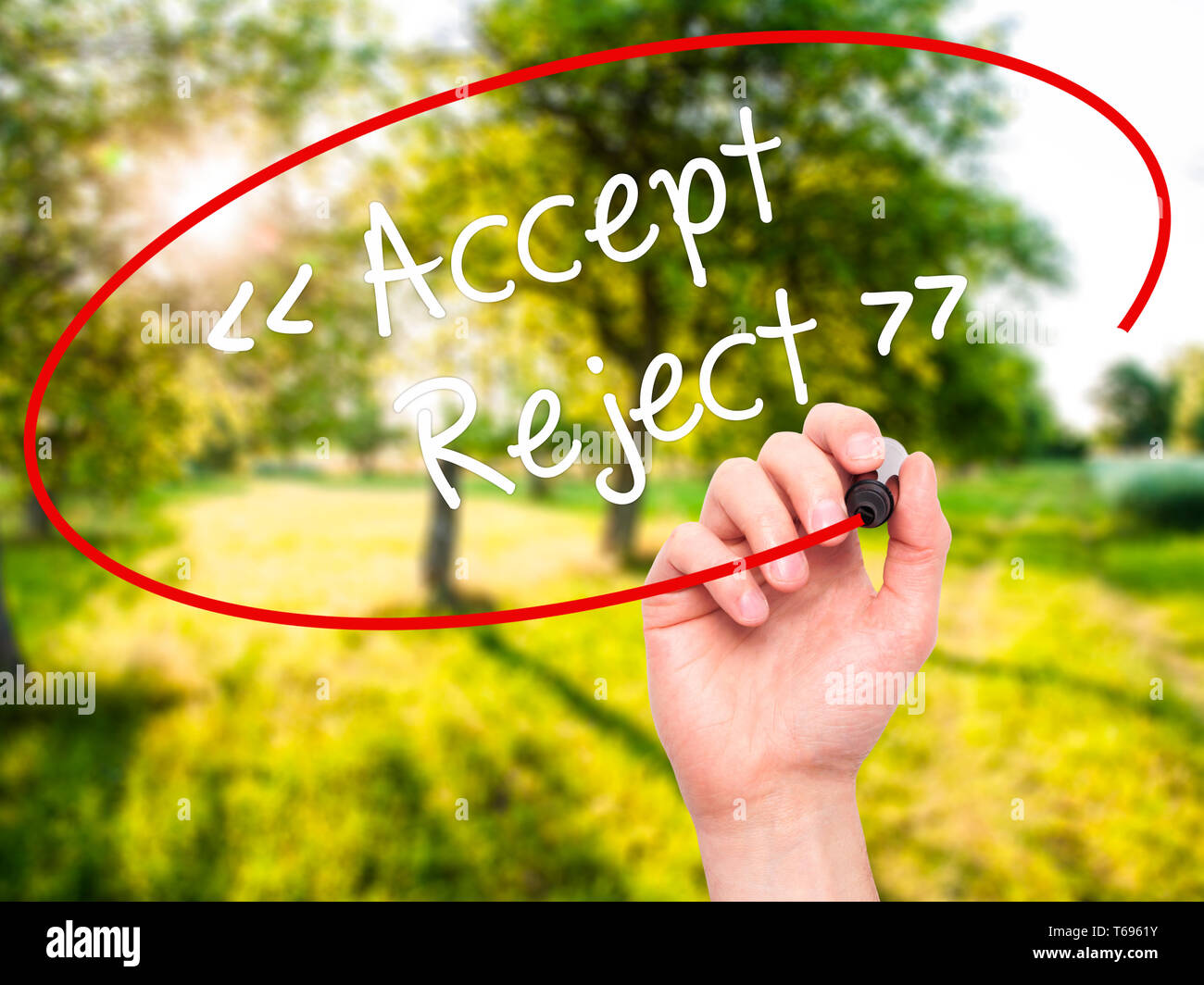 Man Hand writing Accept - Reject with black marker on visual screen ...