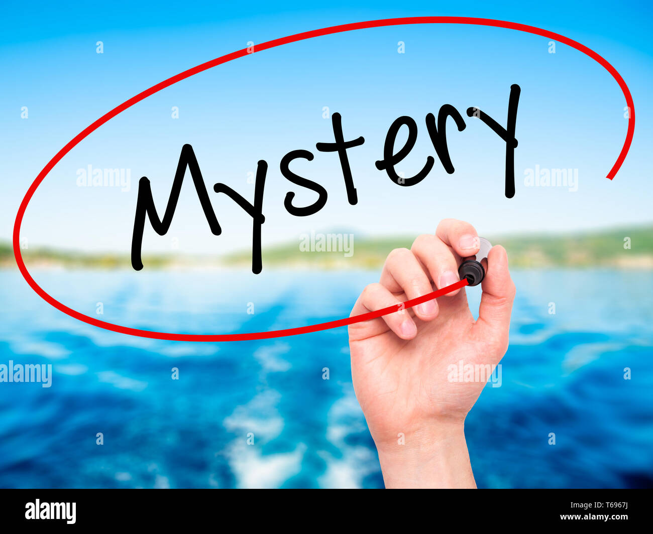 Man Hand writing Mystery with black marker on visual screen Stock Photo ...