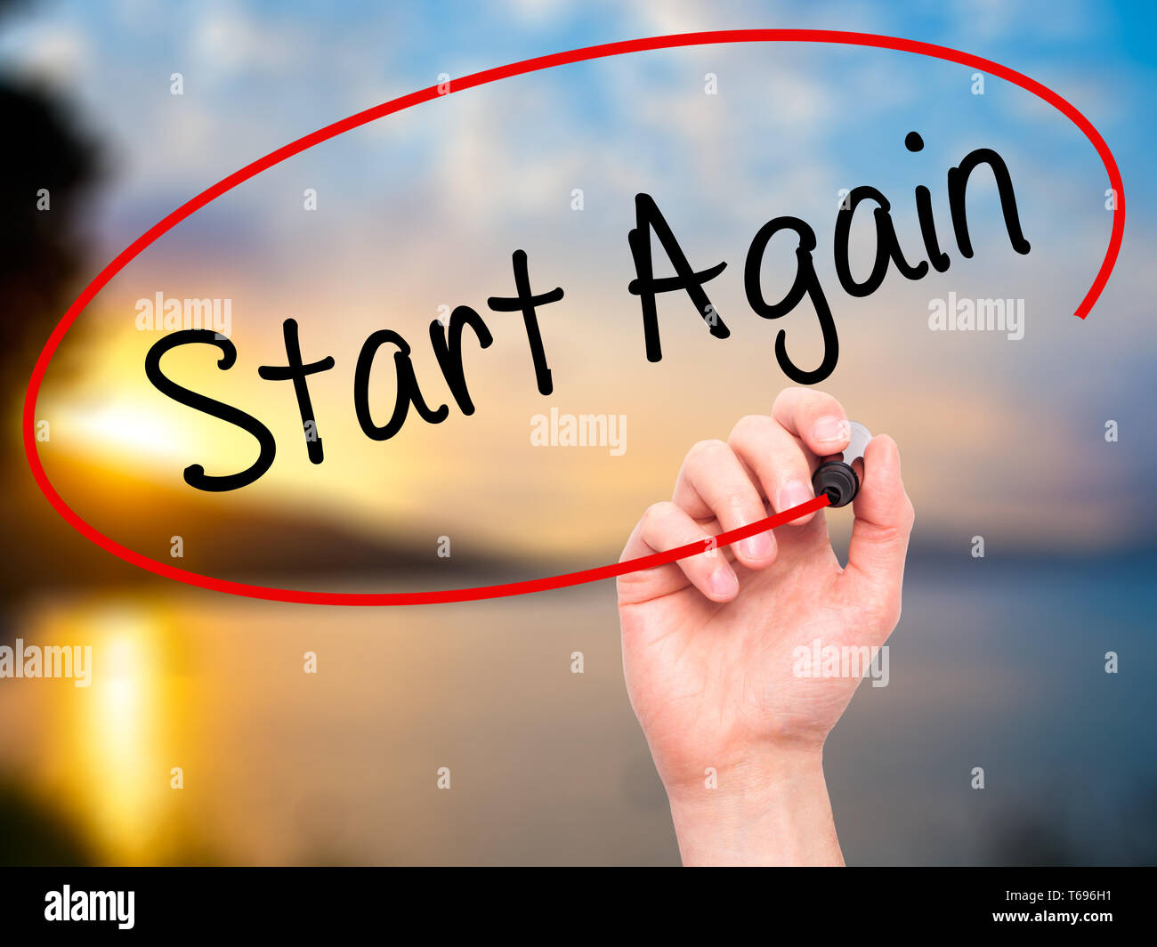 Man Hand writing Start Again with black marker on visual screen Stock ...