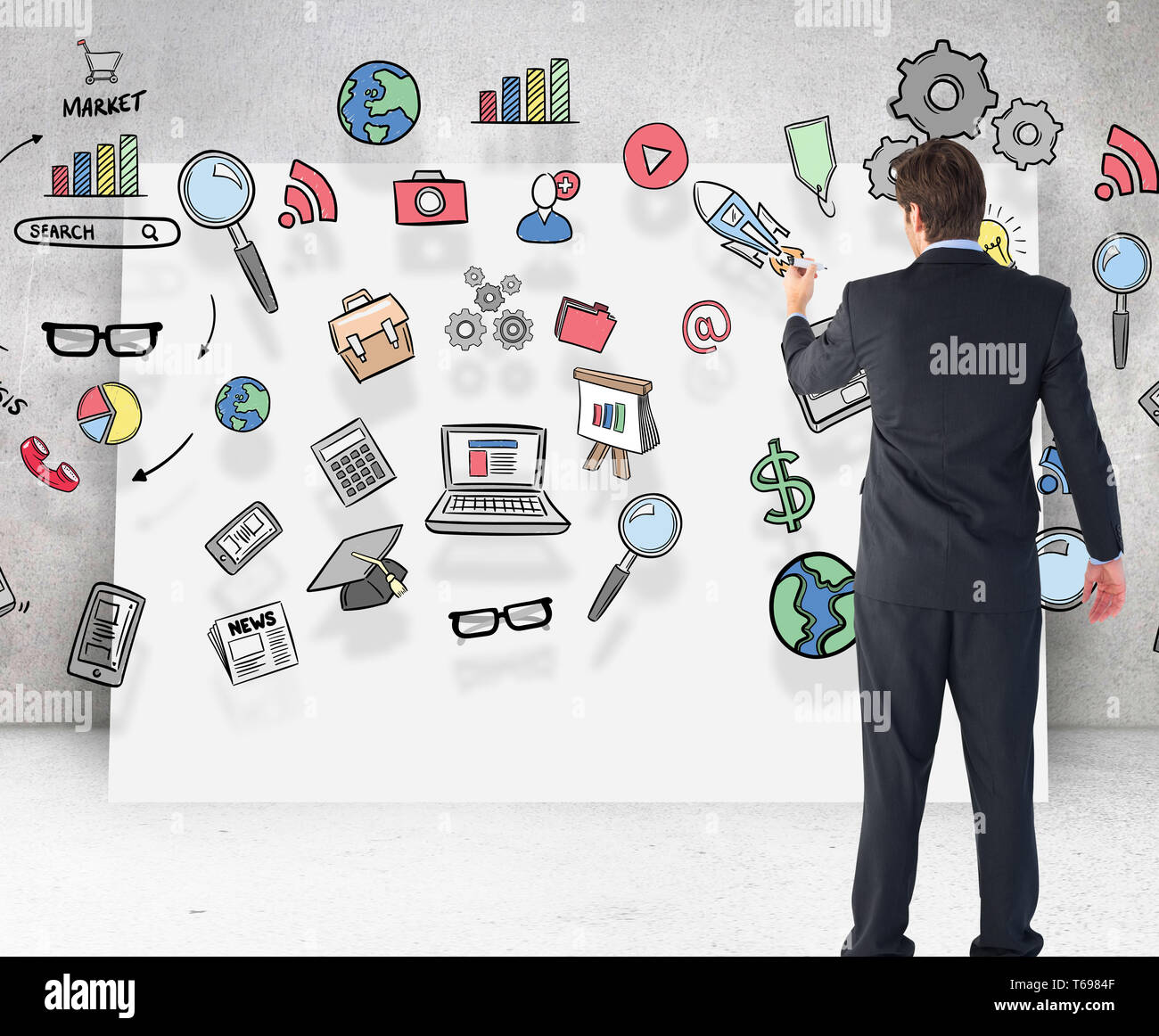 Composite image of businessman standing back to camera writing with ...