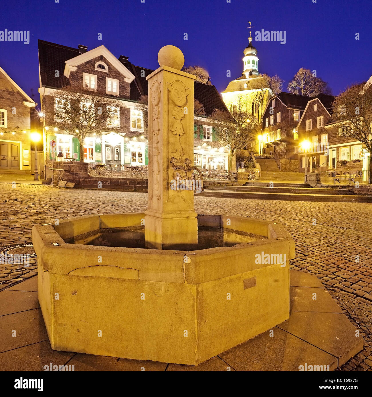 fountain on market place in the old city of Graefrath, Solingen, North ...
