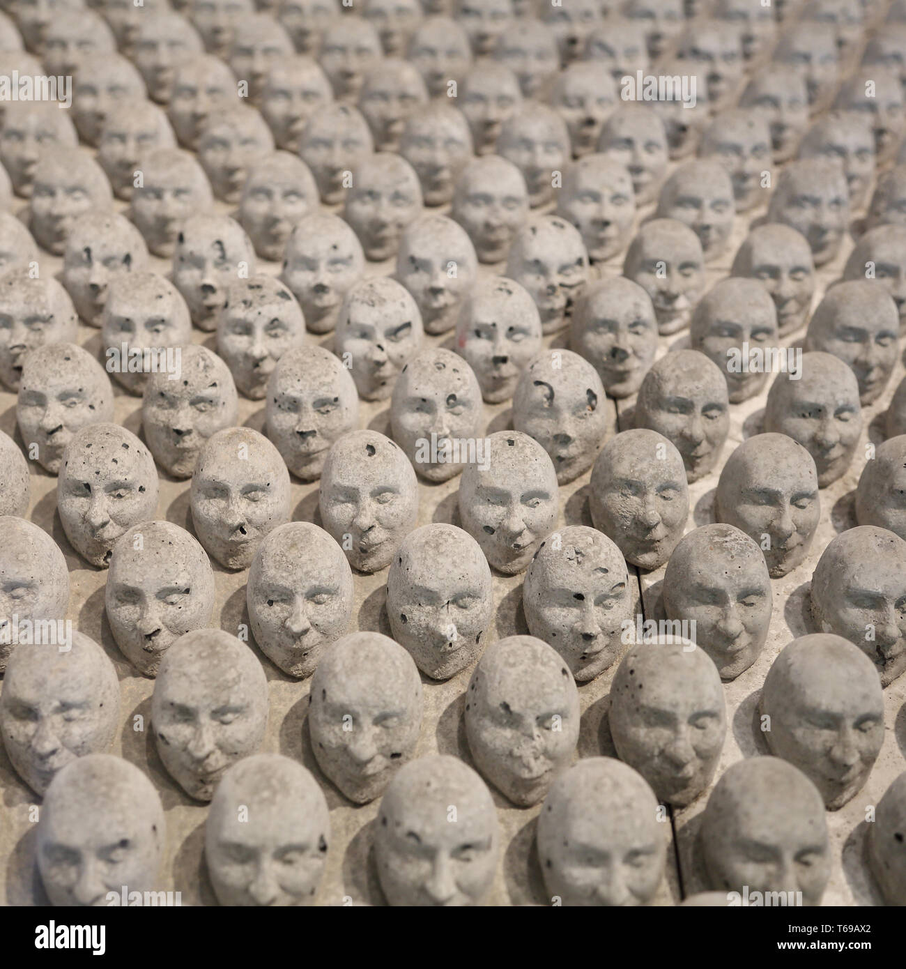 Sculpture miniature of the heads Stock Photo - Alamy
