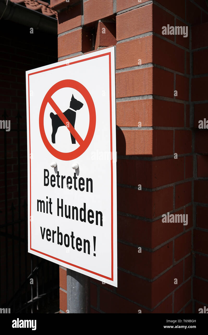sign with the words Access by dogs forbidden Stock Photo - Alamy