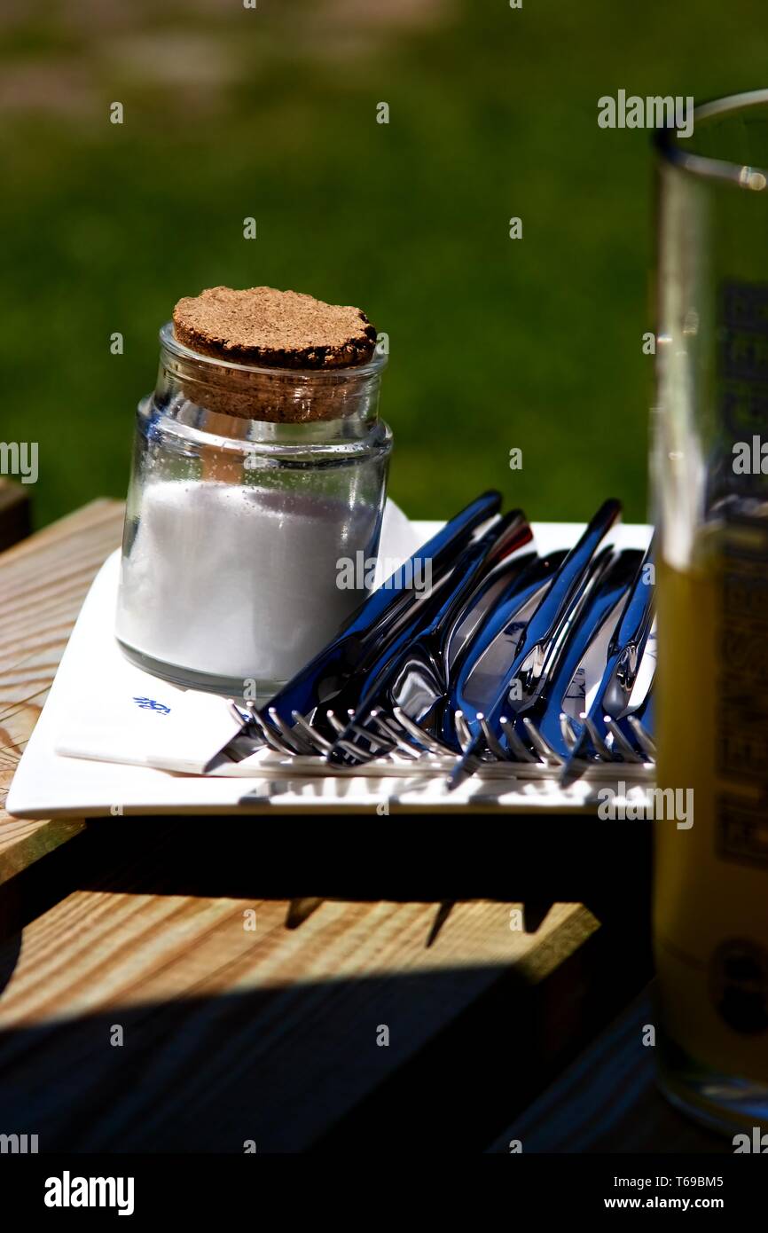 Salt, forks and knifes Stock Photo - Alamy