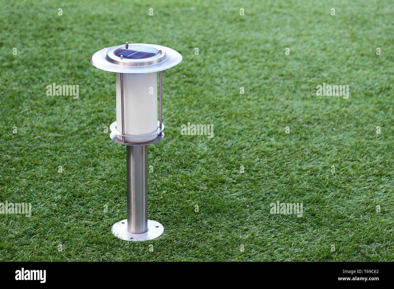 Solar Powered Lamp on Garden Background Stock Photo - Alamy