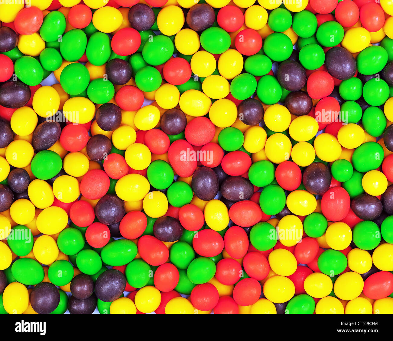 Multicolored candies for use as background Stock Photo - Alamy