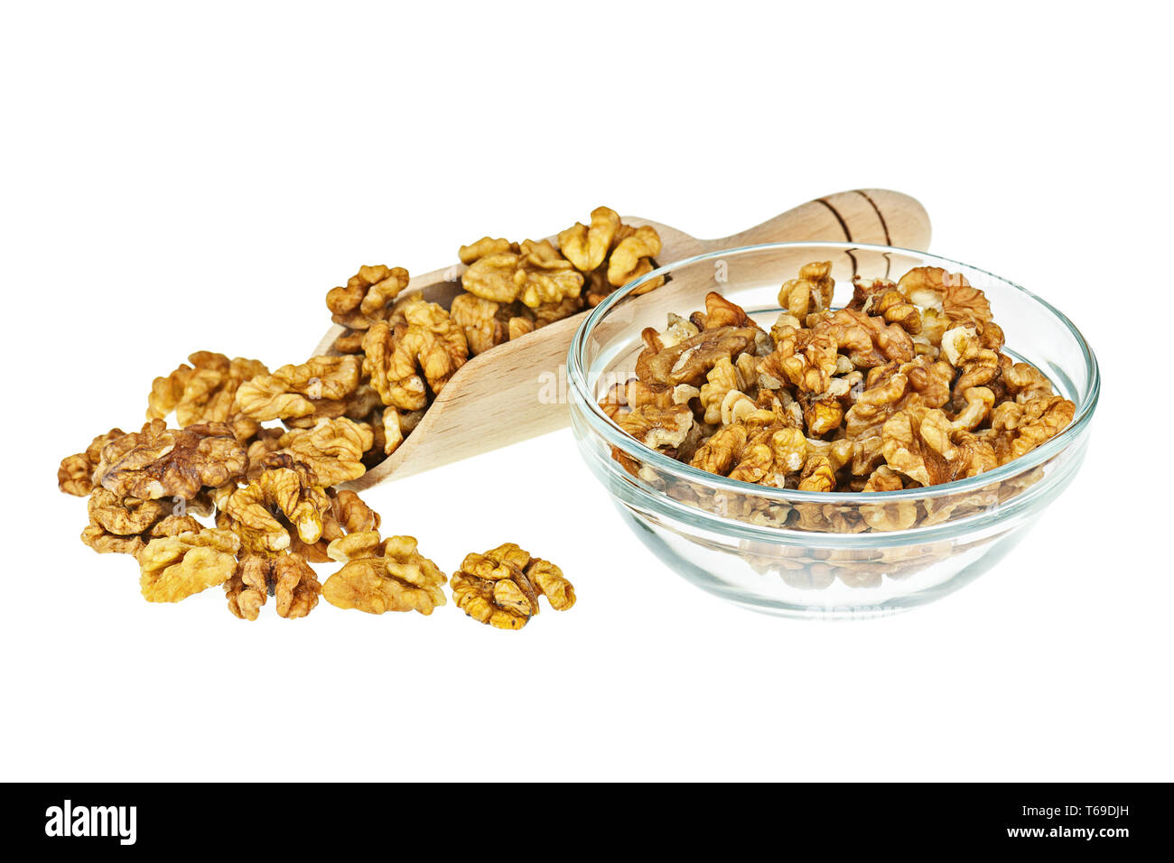 Handful of walnuts in scoop isolated on white background Stock Photo ...