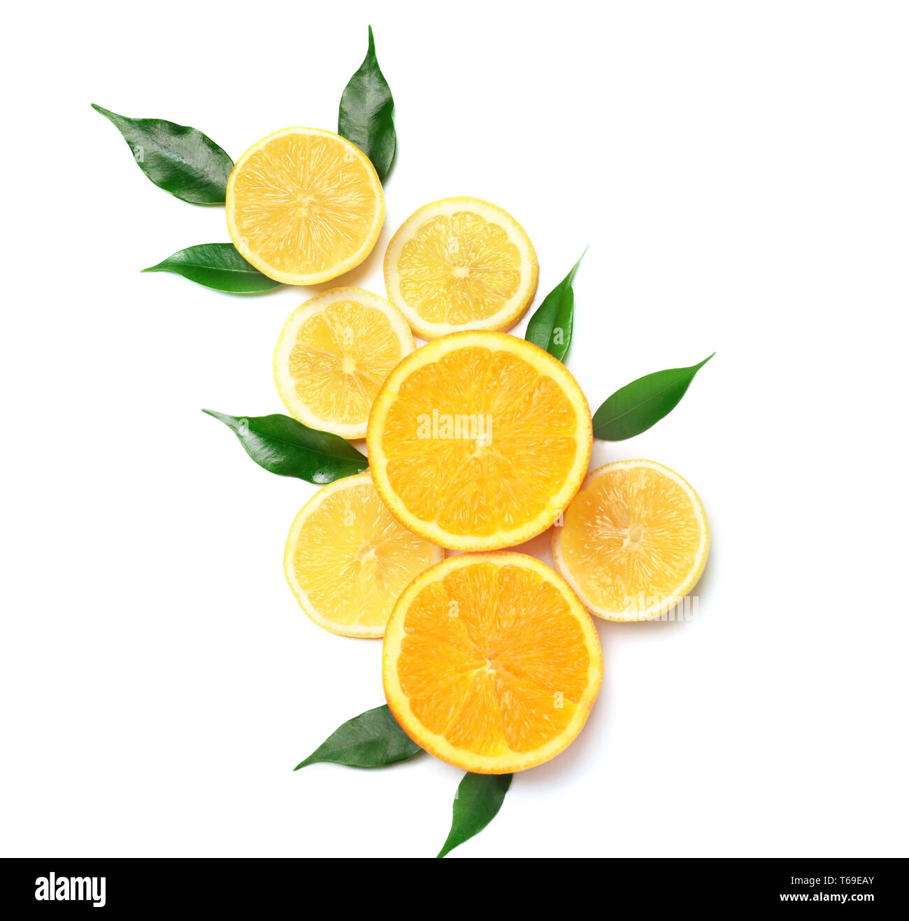 Composition of delicious citrus fruits and green leaves on white ...