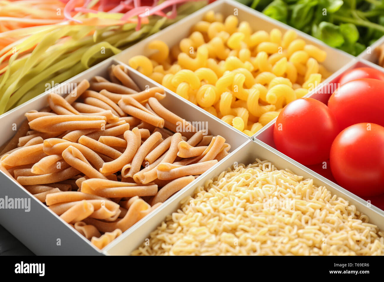 Boxes with different uncooked pasta and products, closeup Stock Photo ...