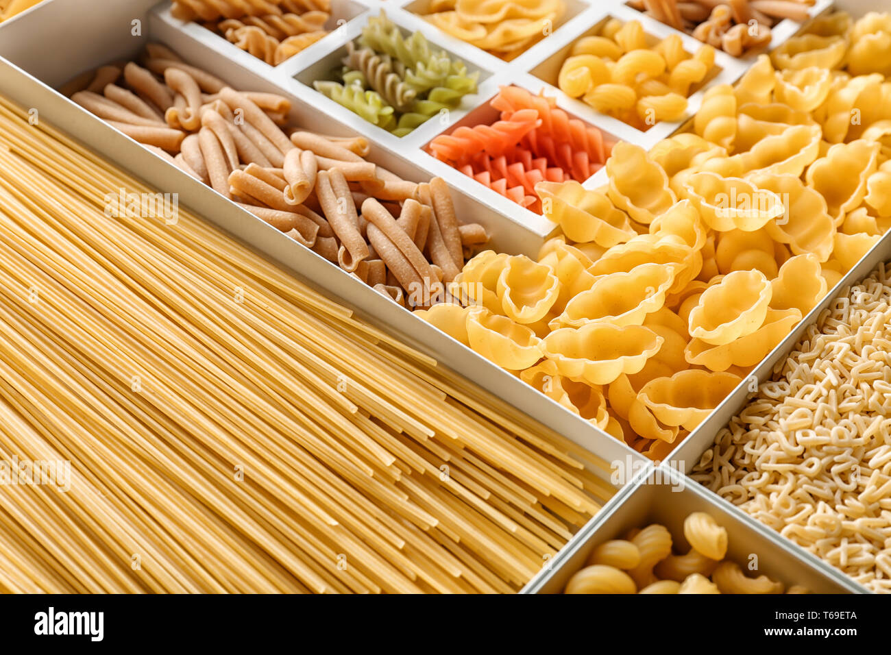 Boxes with different uncooked pasta, closeup Stock Photo - Alamy