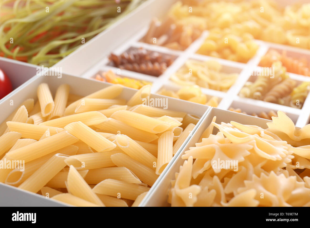 Boxes with different uncooked pasta, closeup Stock Photo - Alamy