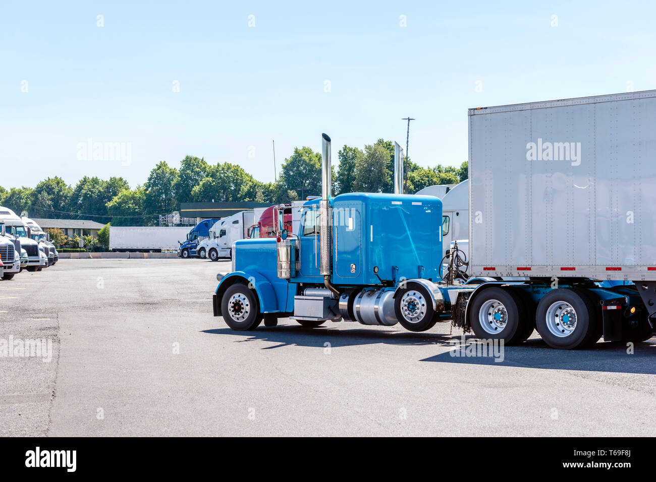Blue classic American freight transportation big rig blue semi truck ...