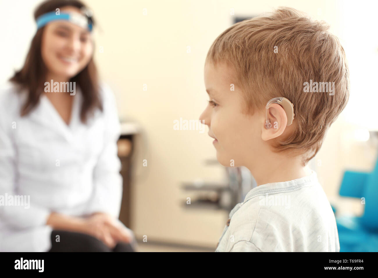 Boy hearing aid hi-res stock photography and images - Alamy