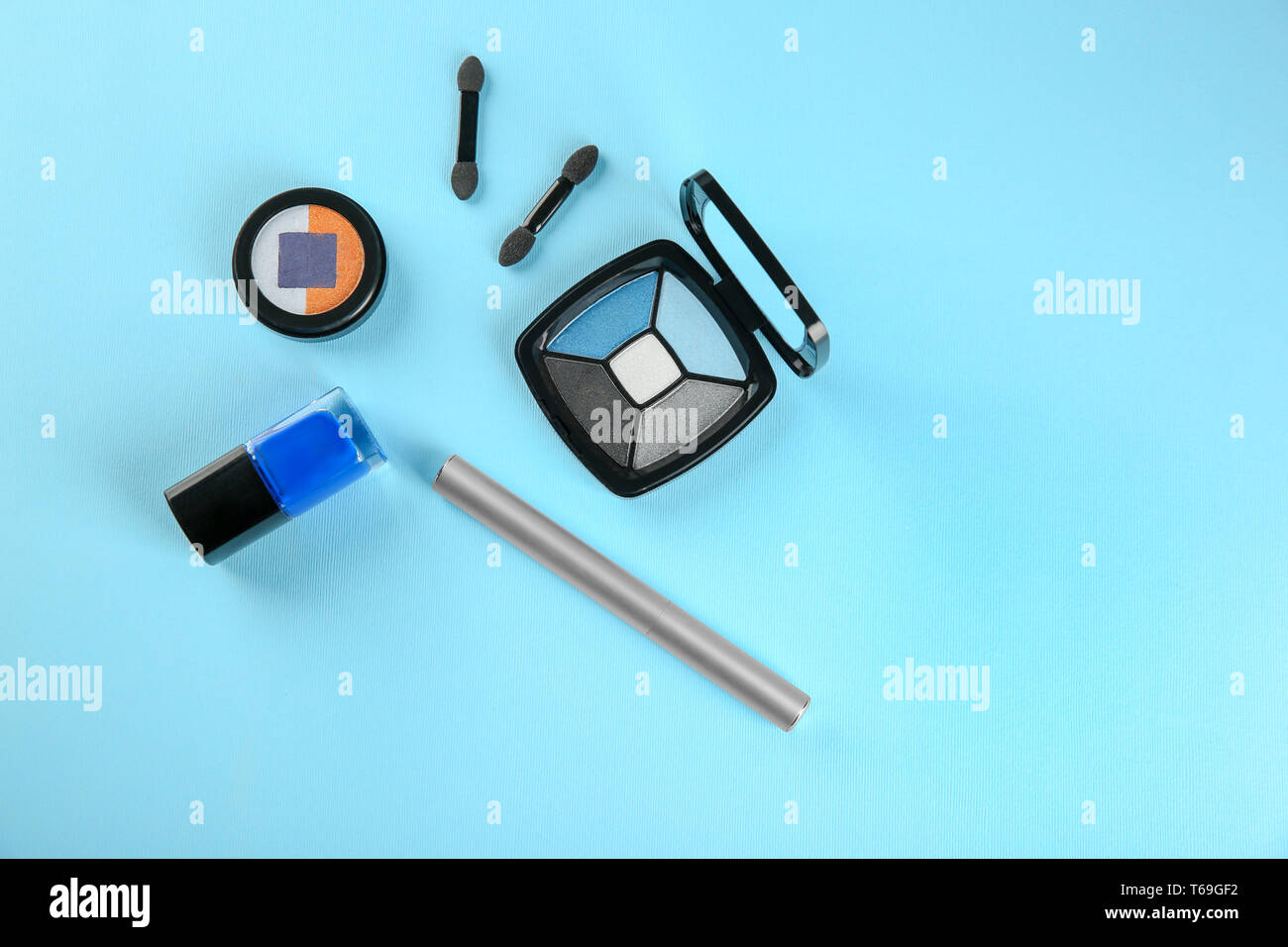 Decorative cosmetics on color background Stock Photo - Alamy