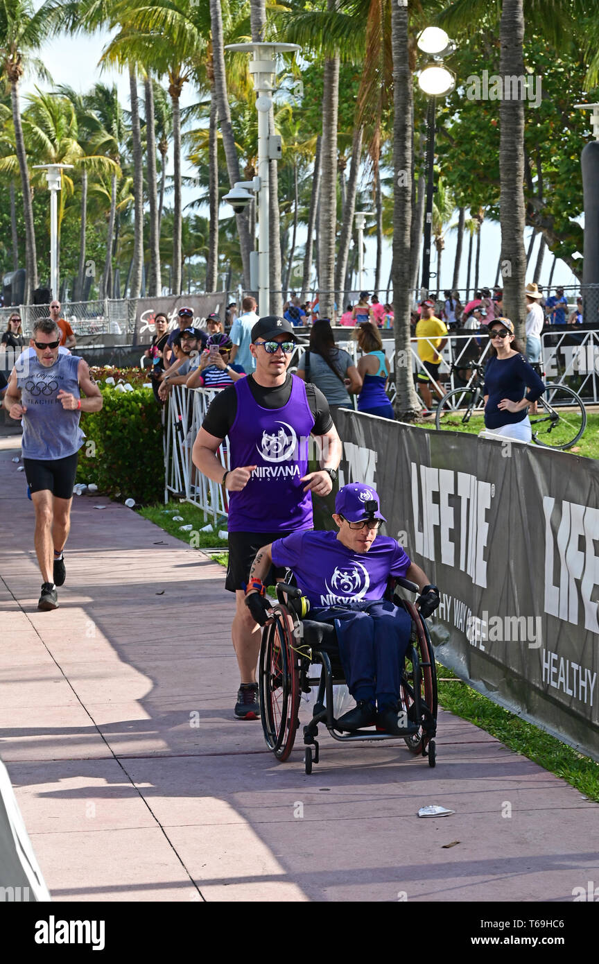 Miami Beach, Florida 2019-04-14 Disabled triathletes participating in ...