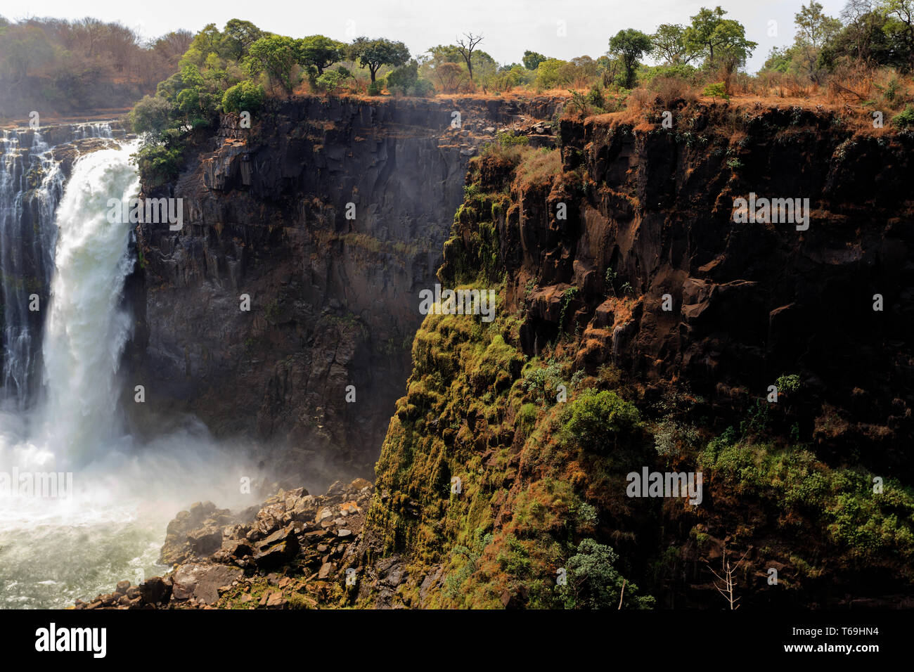The Victoria falls with mist from water Stock Photo - Alamy