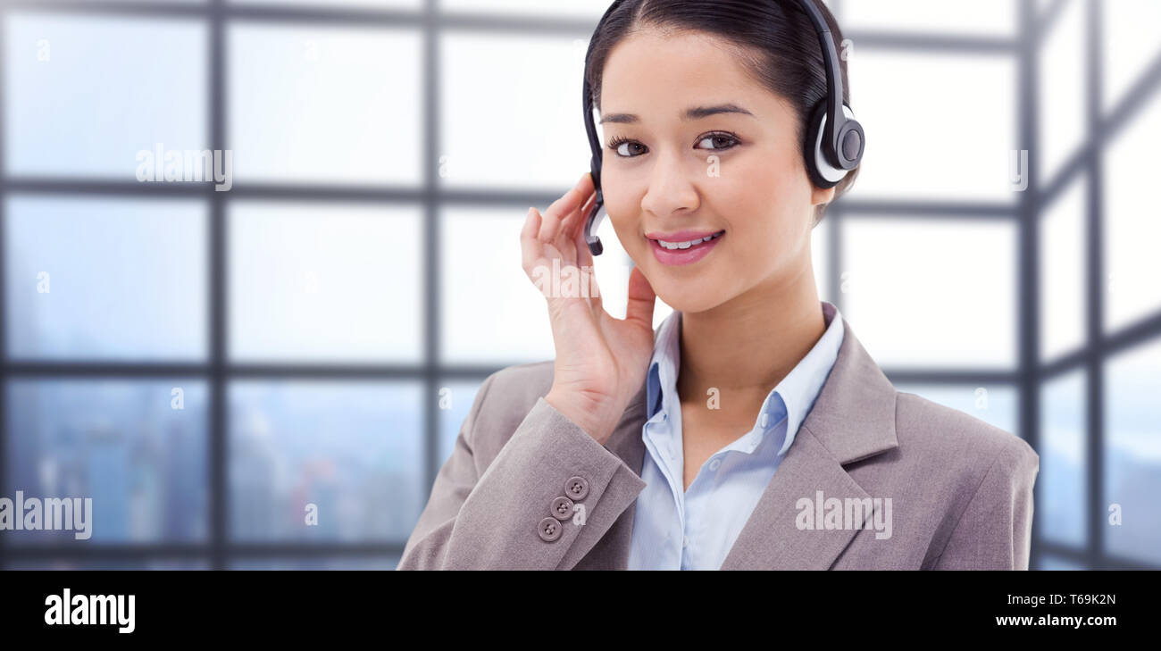 Composite image of portrait of a good looking operator posing with a ...