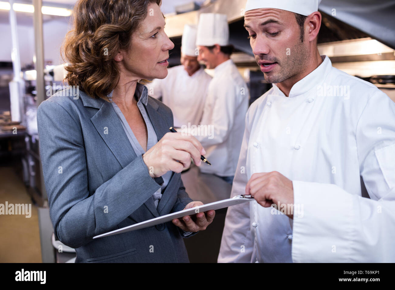 Female restaurant manager hi-res stock photography and images - Alamy