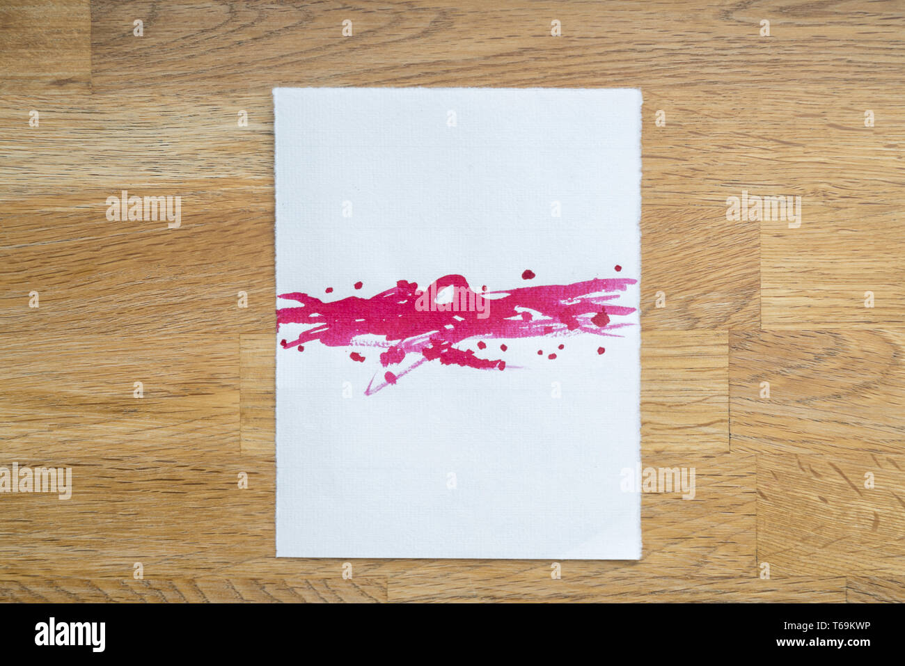 Ink splash on paper hi-res stock photography and images - Alamy