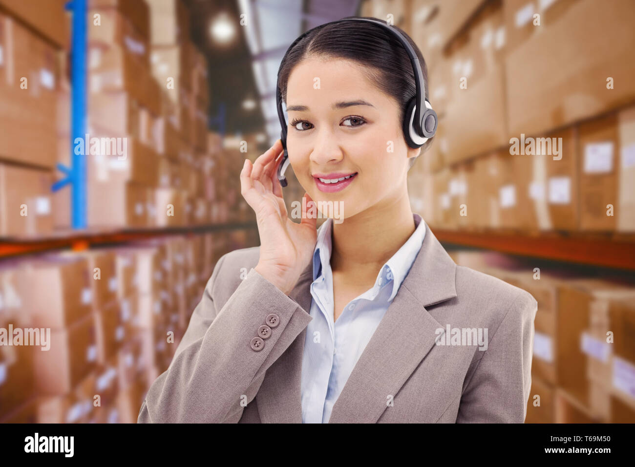 Composite image of portrait of a good looking operator posing with a ...