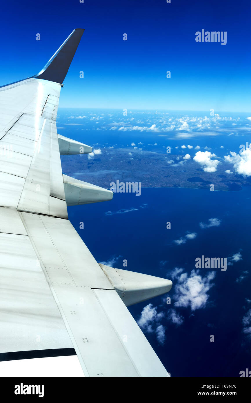 aircraft wing on blue sky Stock Photo - Alamy