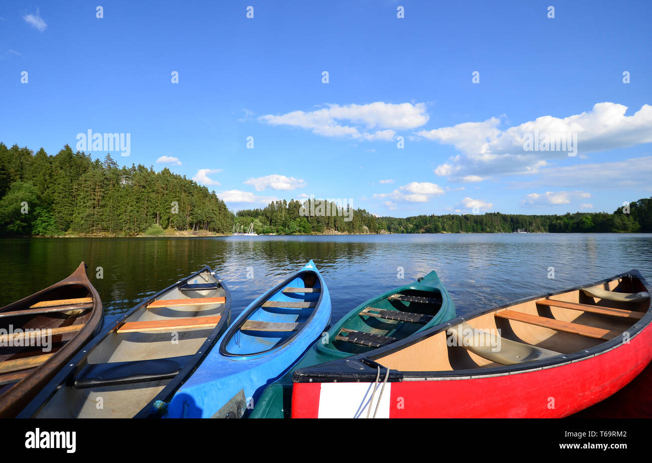 Colourful canoes at Ottenstein water reservoir. Austria Stock Photo - Alamy