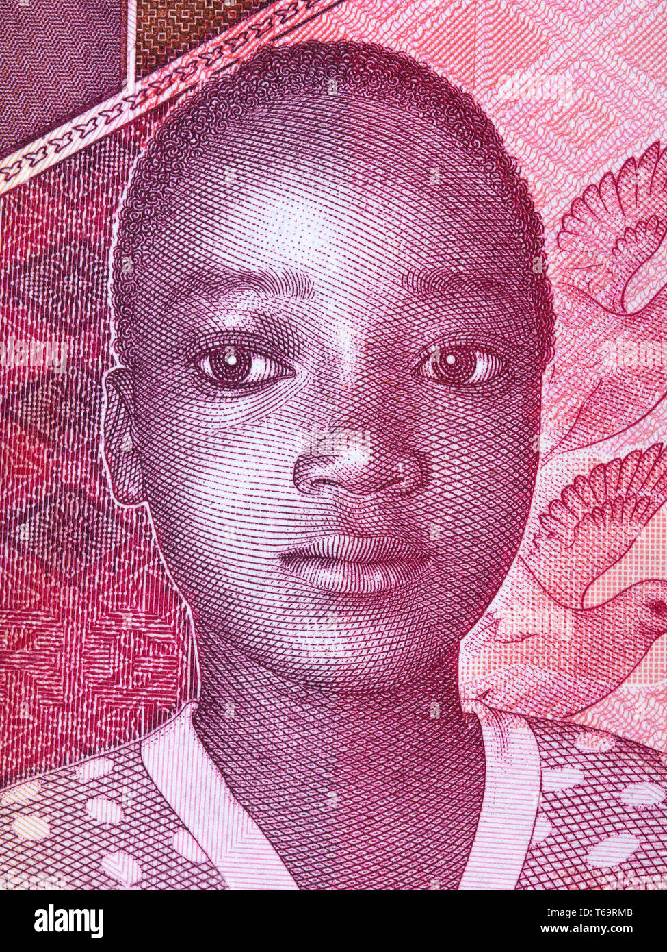 Guinean boy, a portrait from money Stock Photo - Alamy