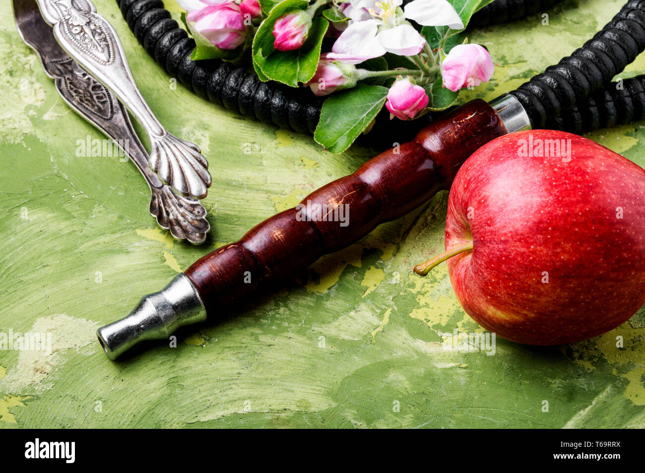 Oriental smoking hookah. Arabian shisha with apple. Hookah and apple ...