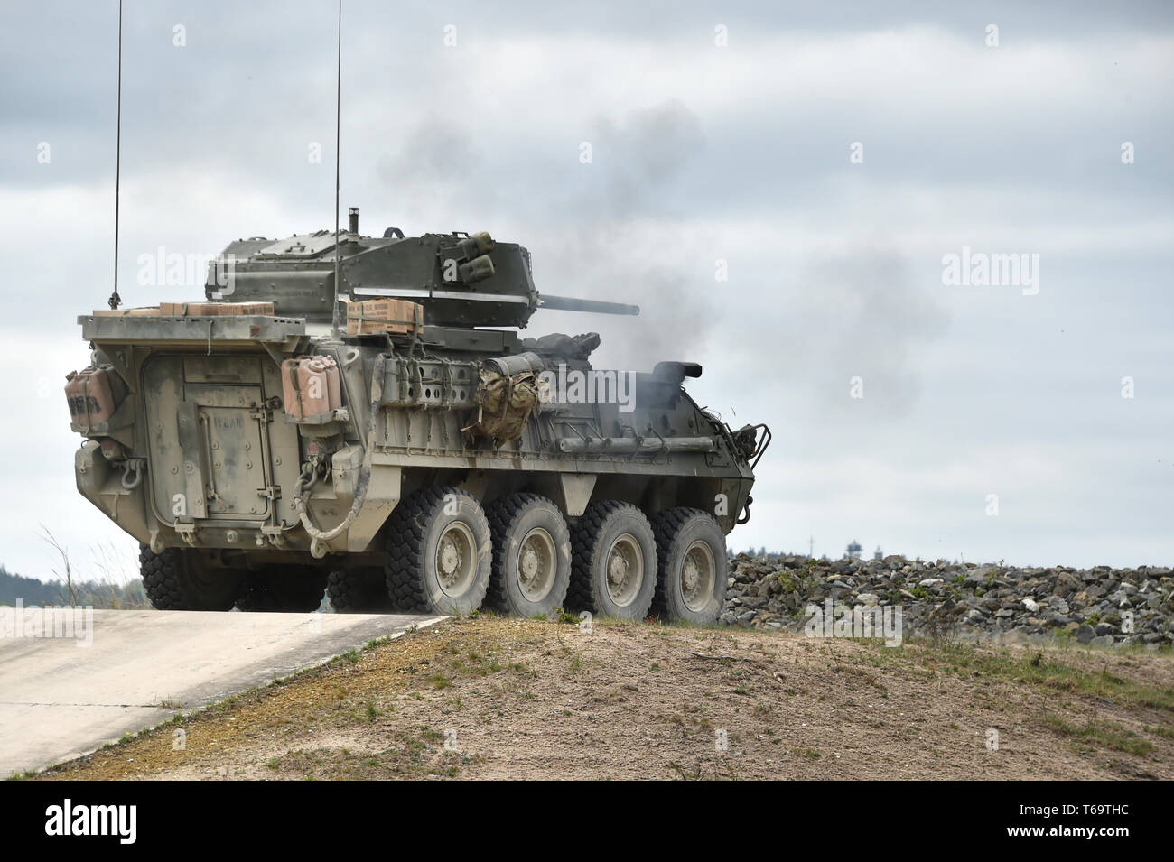 A U. S. Army Stryker Infantry Carrier Vehicle-Dragoon crew with Apache ...
