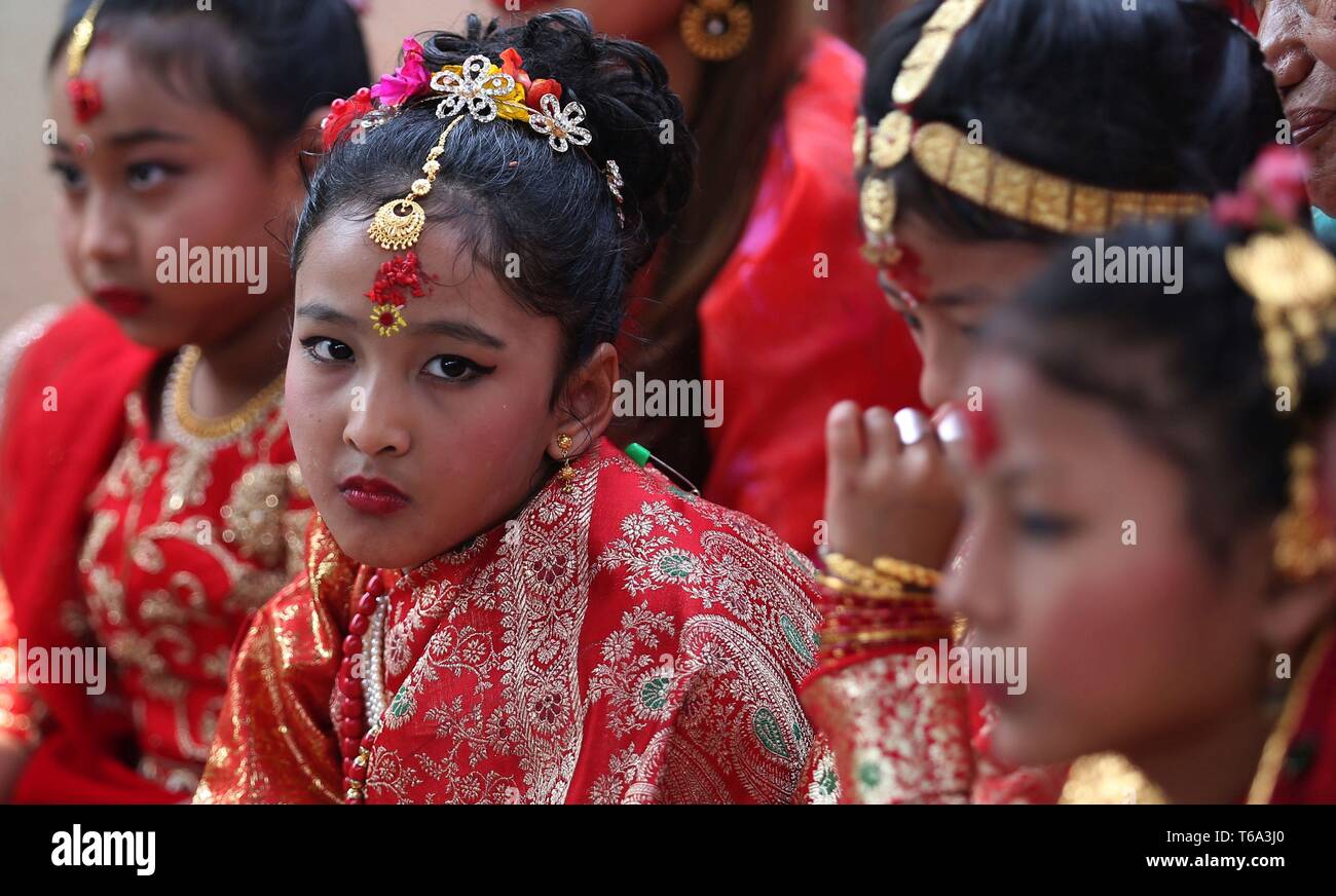 Kathmandu, Nepal. 30th Apr, 2019. Girls from the Newar community attend ...