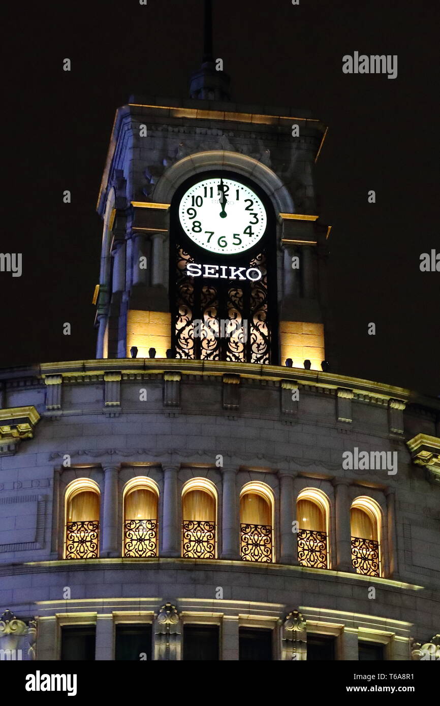 The famous clock of Wako department store shows 23:59 local time in ...
