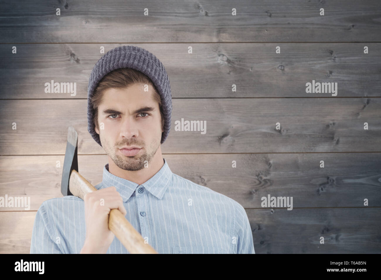 Hipster holding axe on shoulder hi-res stock photography and images - Alamy