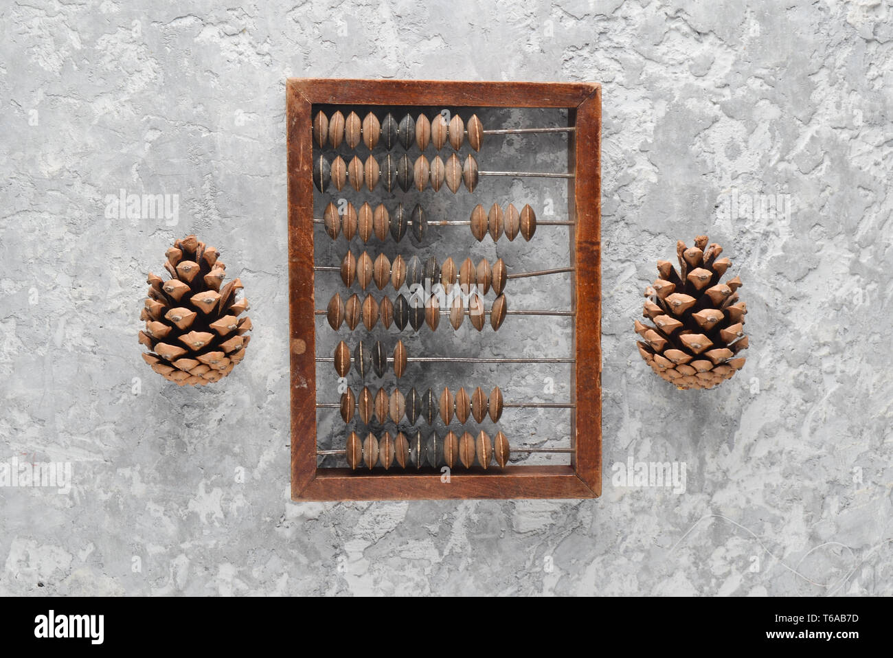 Vintage scores and cones on concrete table. Top view. Ancient methods ...