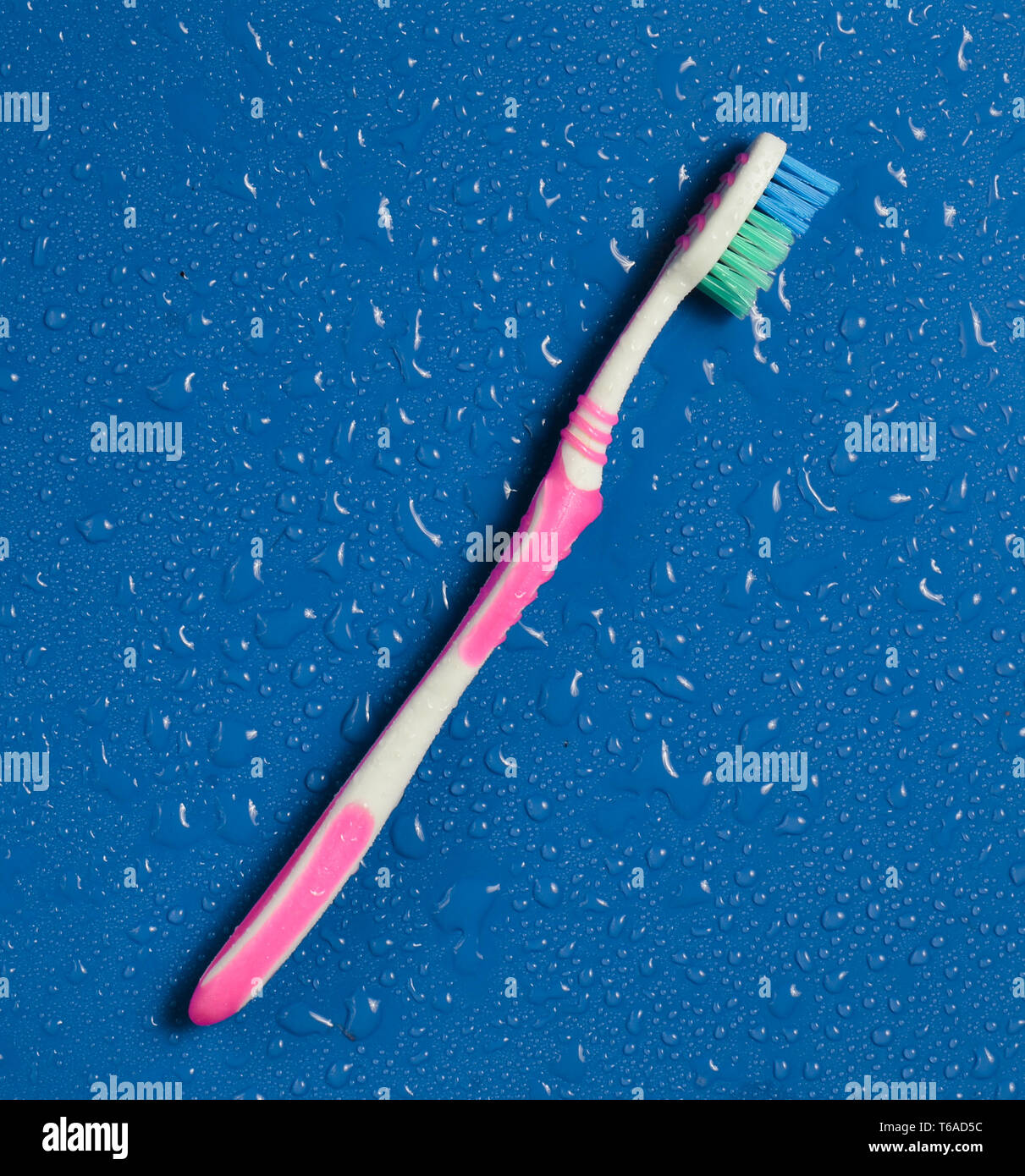 Toothbrush in drops water hi-res stock photography and images - Alamy