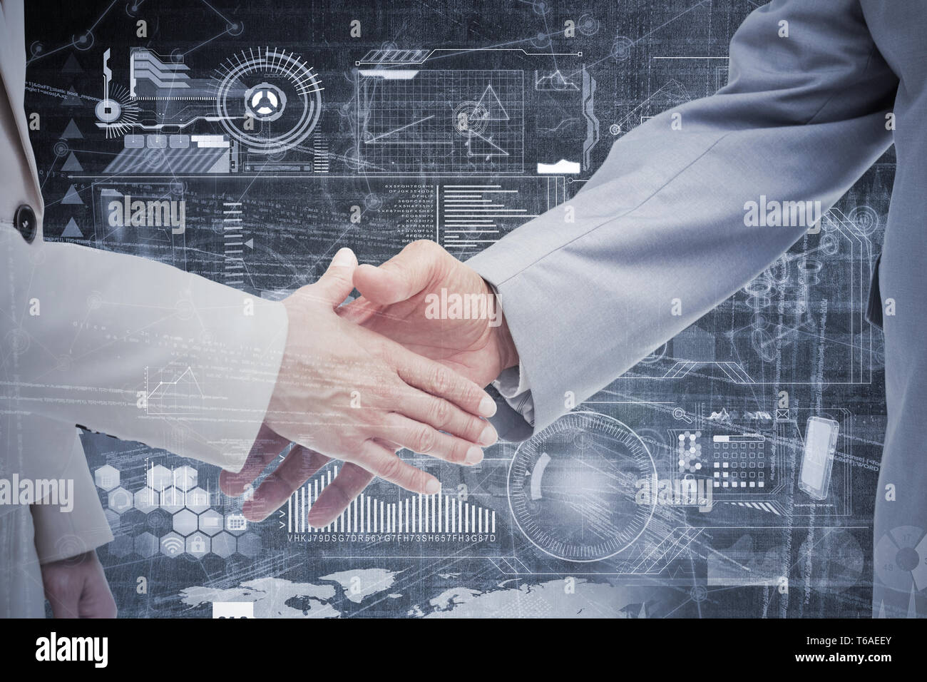 Composite image of close up of business people shaking their hands ...